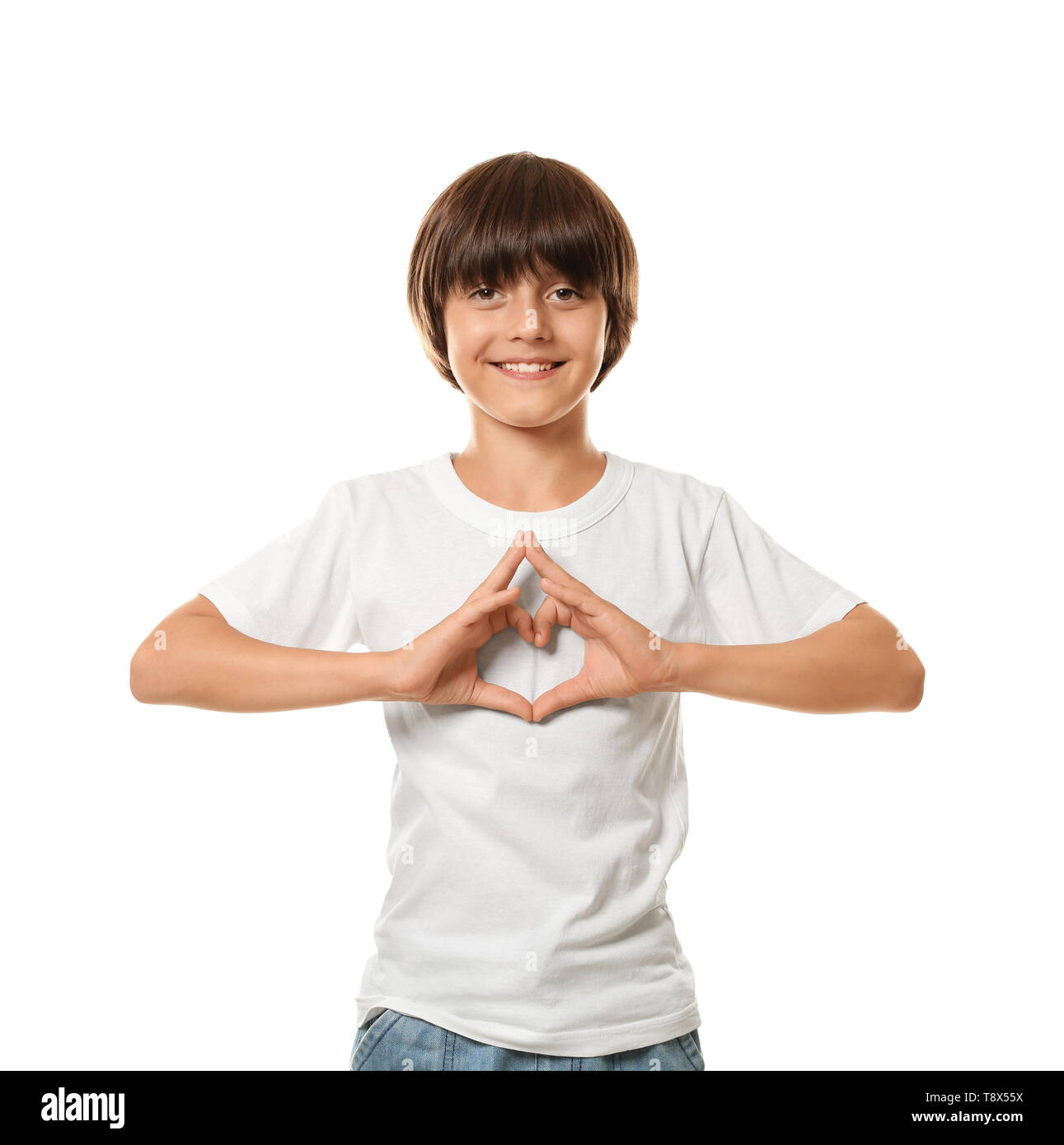 Little boy making heart with his fingers on white background Stock ...