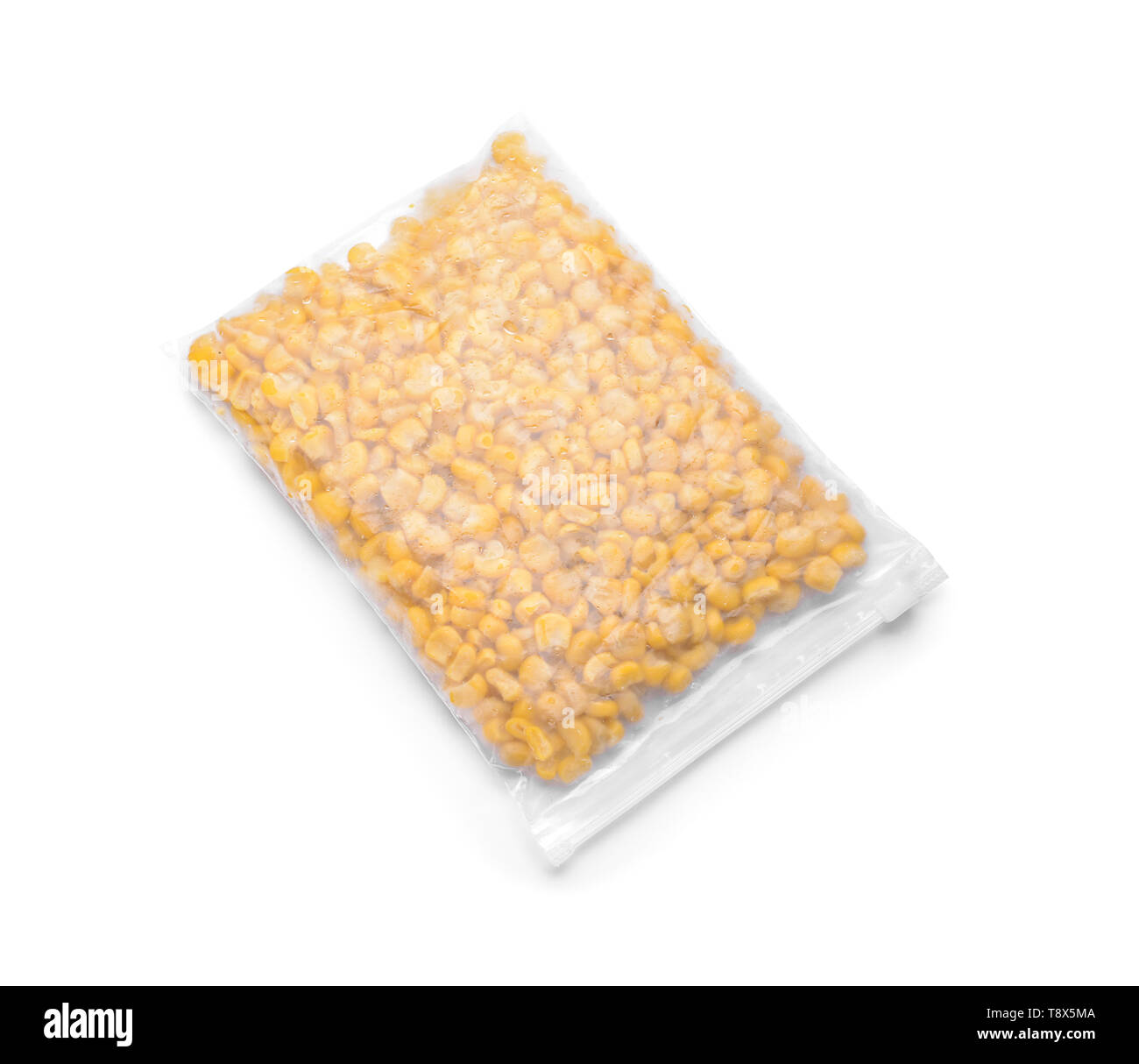 Plastic bag with frozen corn on white background Stock Photo - Alamy