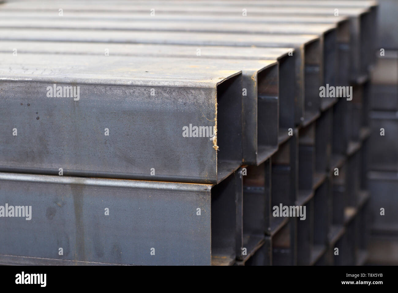 Metal profile pipe of rectangular cross section in packs at the ...