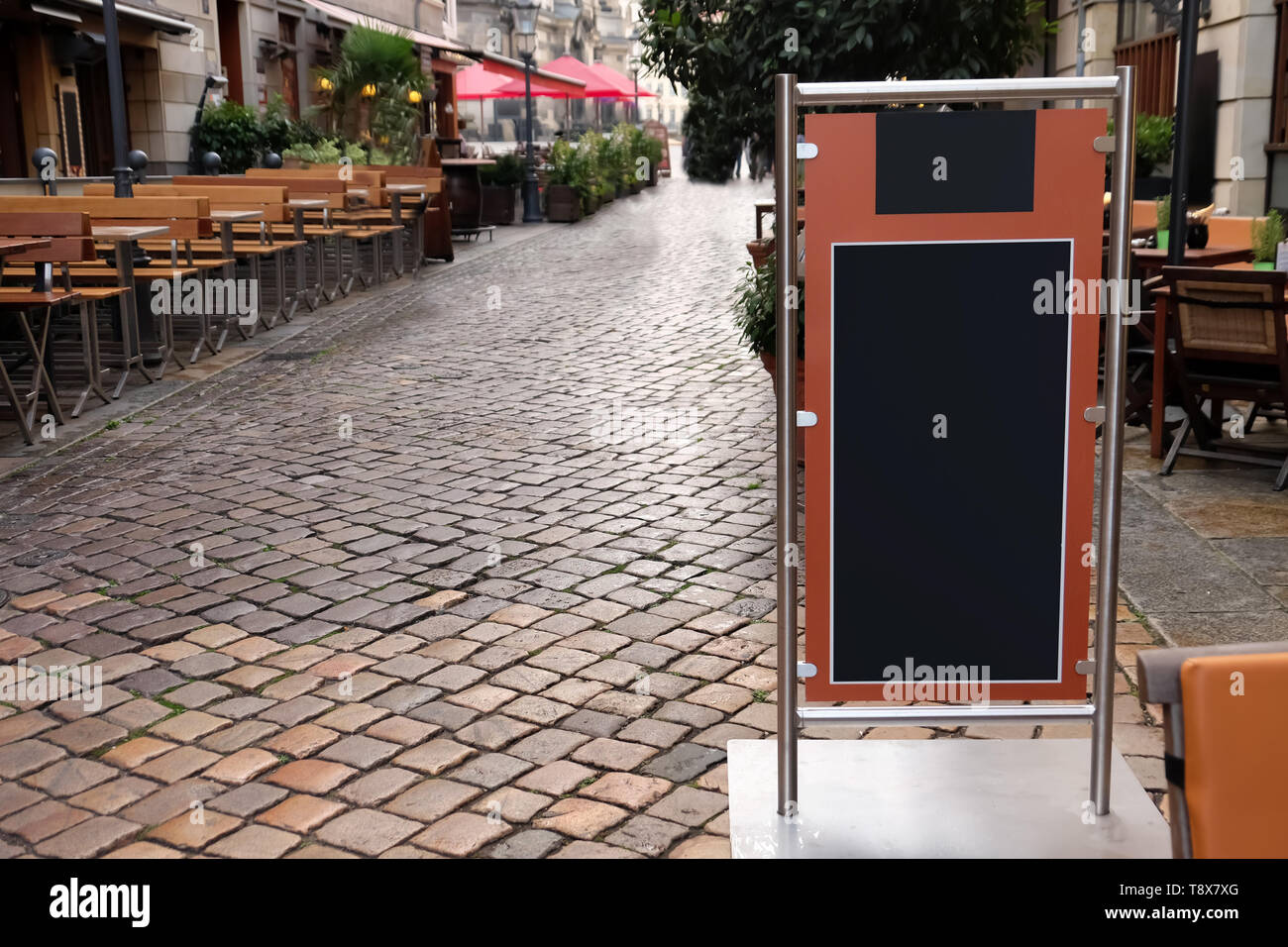 Menu board of restaurant on city street Stock Photo - Alamy