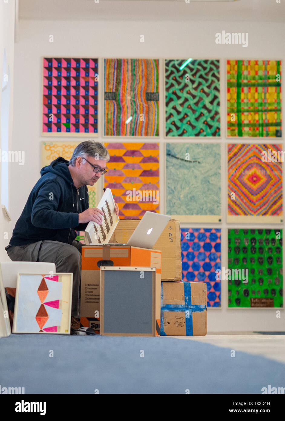 Magdeburg, Germany. 15th May, 2019. The artist Martin Assig works at ...