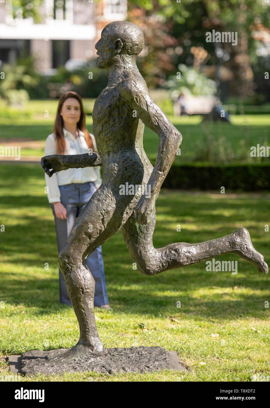 The running man sculpture hi-res stock photography and images - Alamy