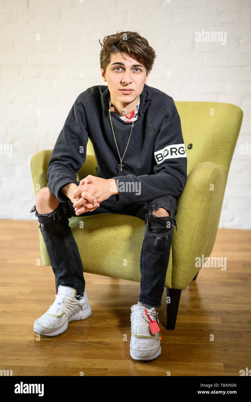 02 May 2019, Berlin: Lukas Rieger, pop singer, sits in an armchair in ...
