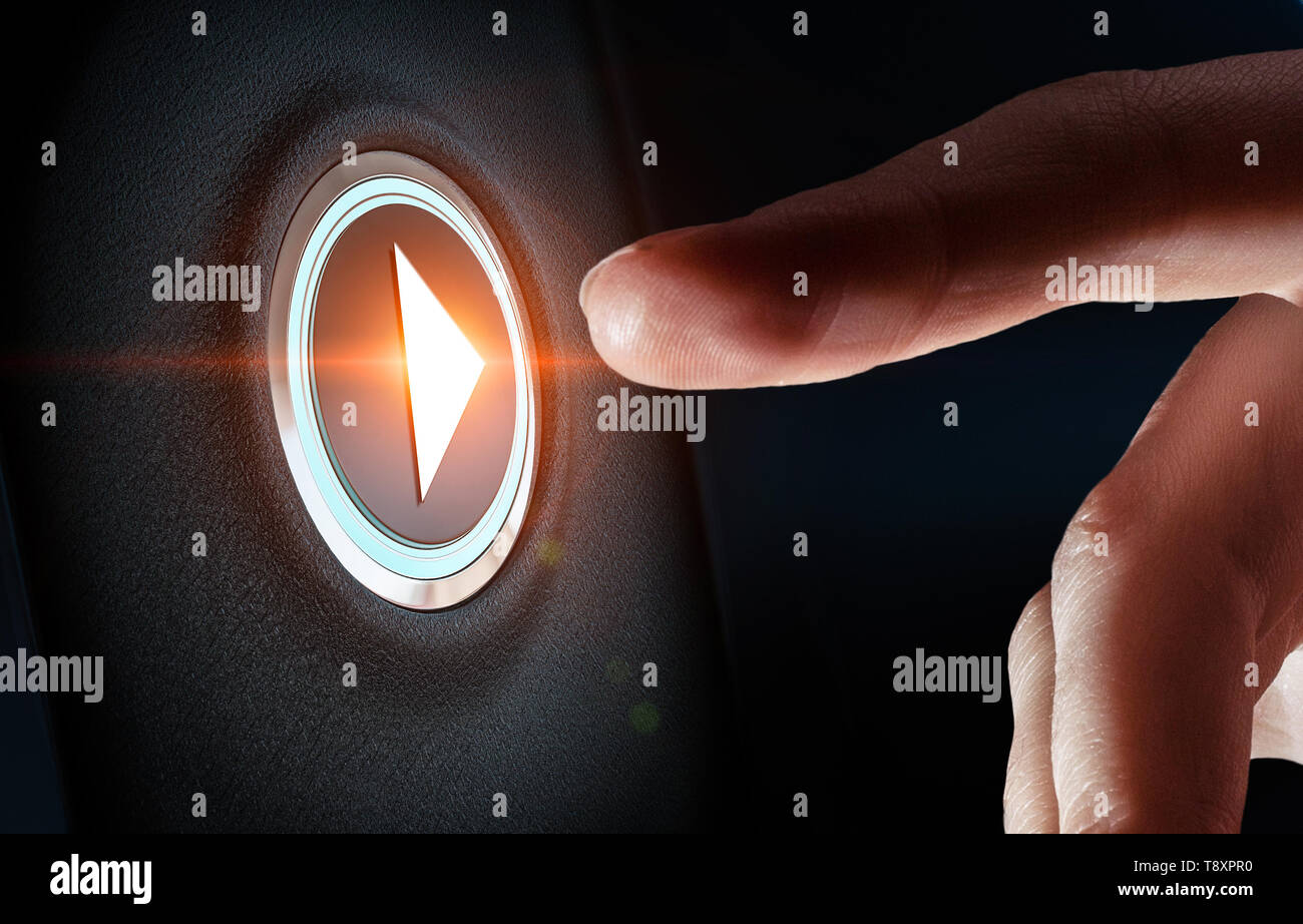 Finger about to press play button. Mixed media Stock Photo - Alamy