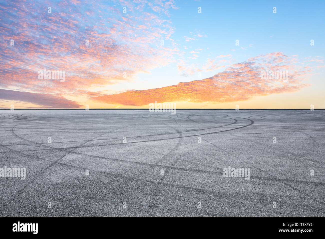 Asphalt race track ground and beautiful sky clouds at sunrise Stock ...