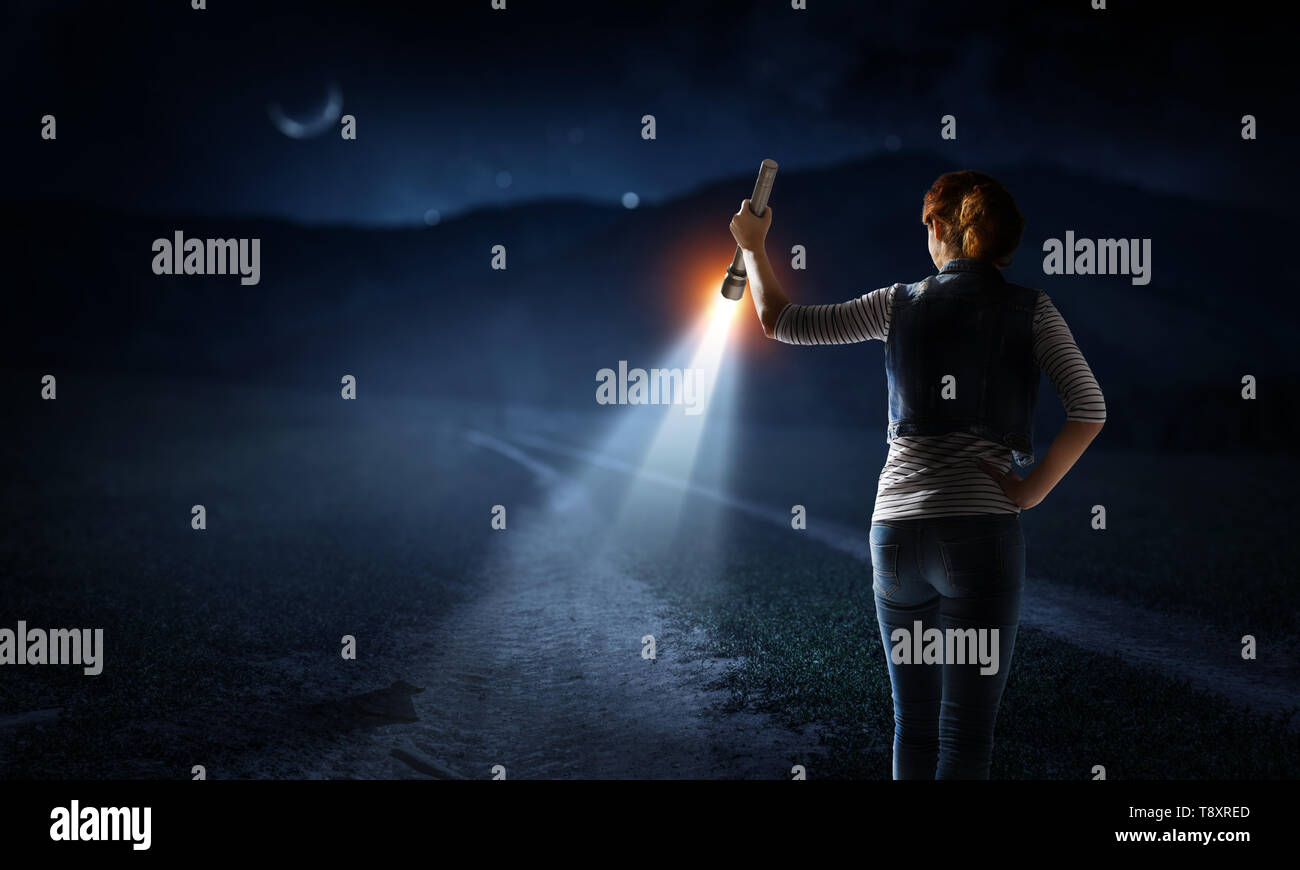 Woman flashlight dark hi-res stock photography and images - Alamy
