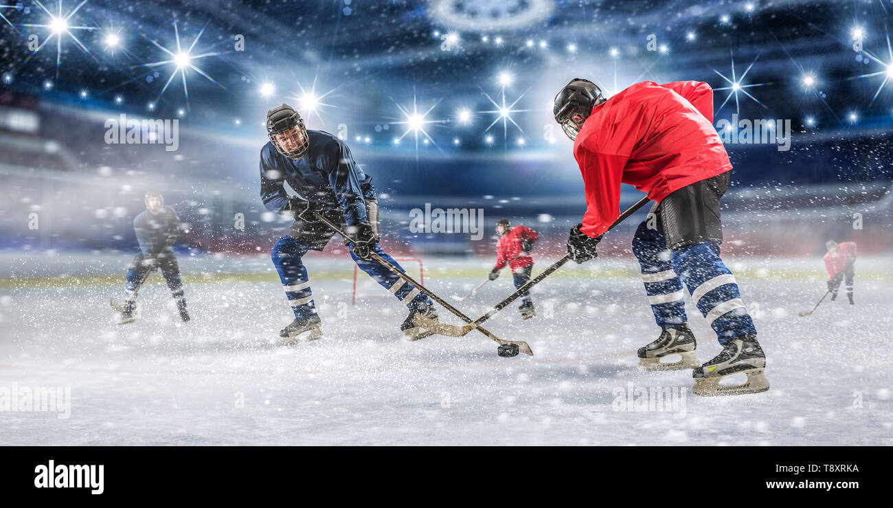 Ice hockey players in action Stock Photo - Alamy