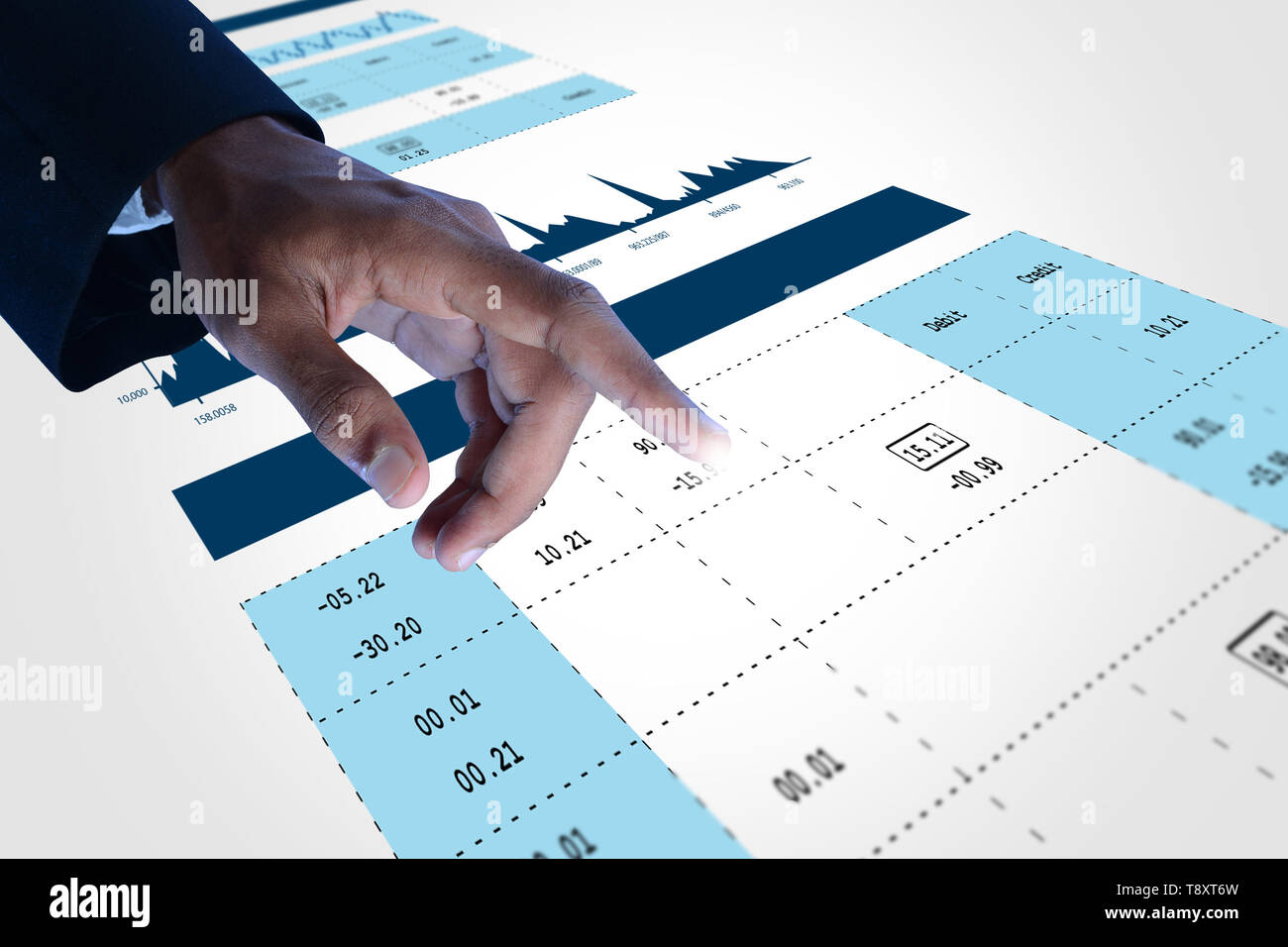 Man hand showing Stock market graph analysis Stock Photo - Alamy