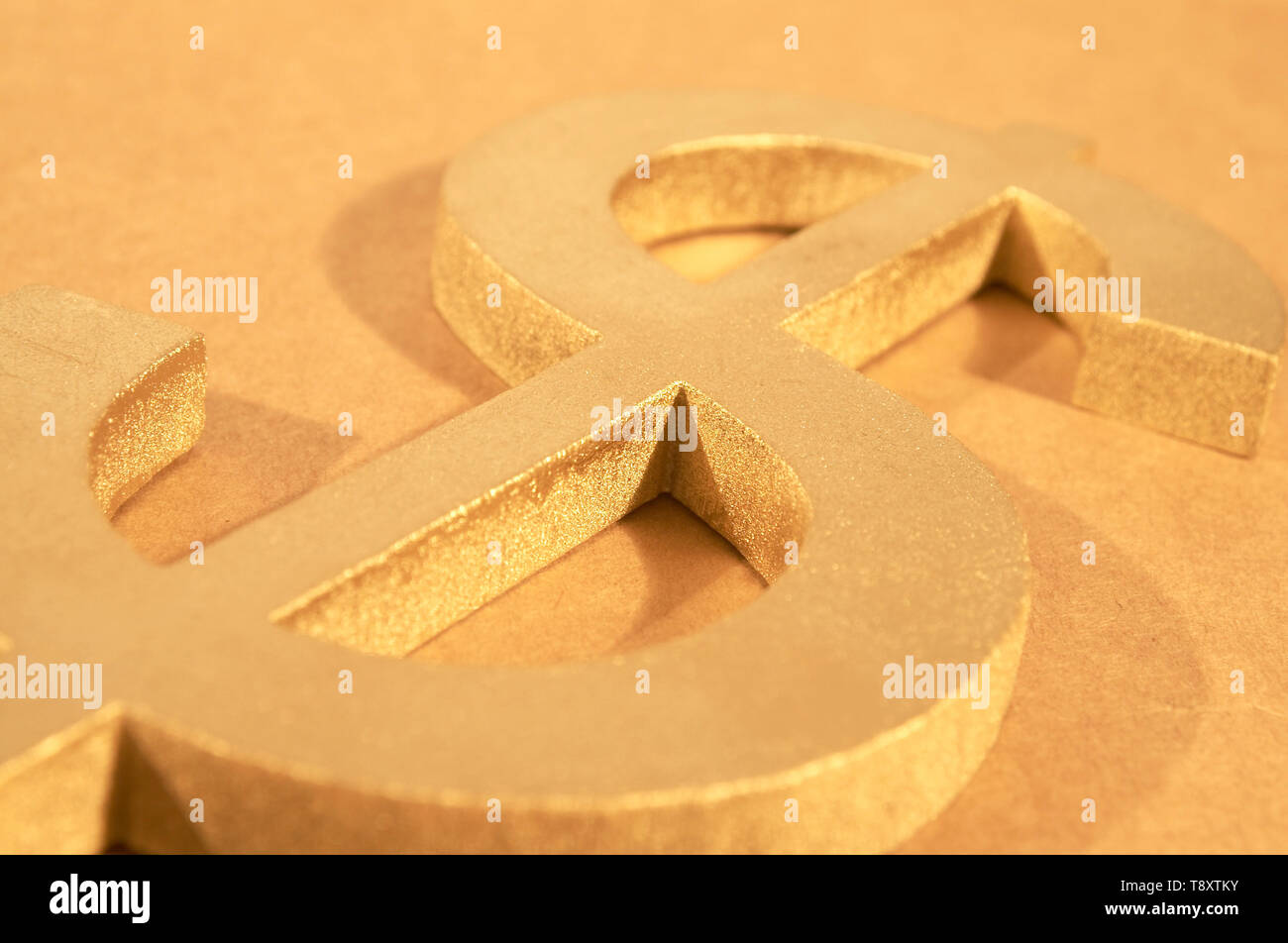 Us dollar sign on old paper, shallow dof Stock Photo - Alamy