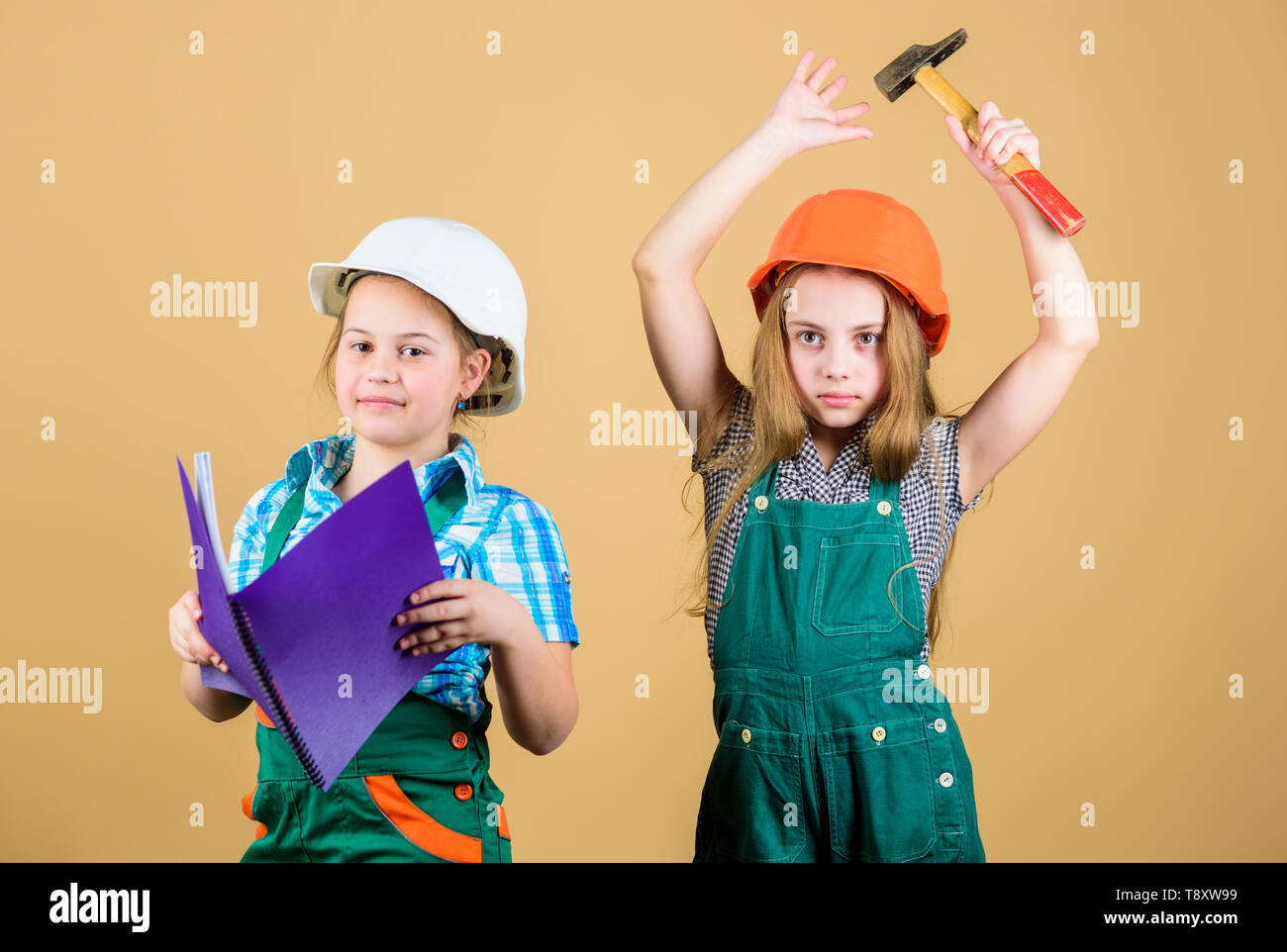 happy children. Future career. small girls repairing together in ...