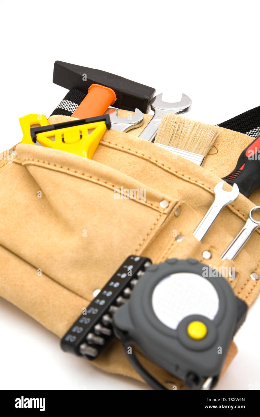 tool bag full with a lot of construction tools on white background ...