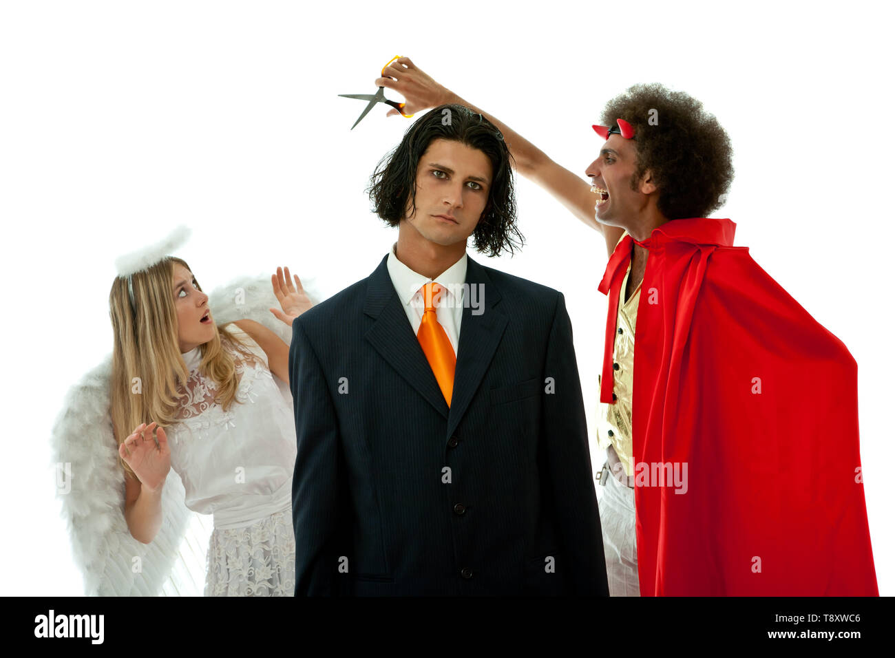 Angel and devil fighting hi-res stock photography and images - Alamy