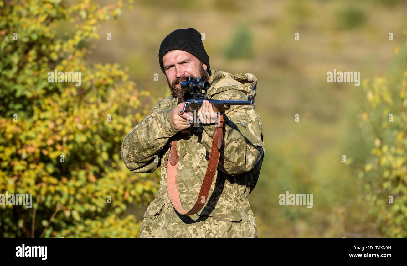 Bearded hunter spend leisure hunting. Focus and concentration of ...