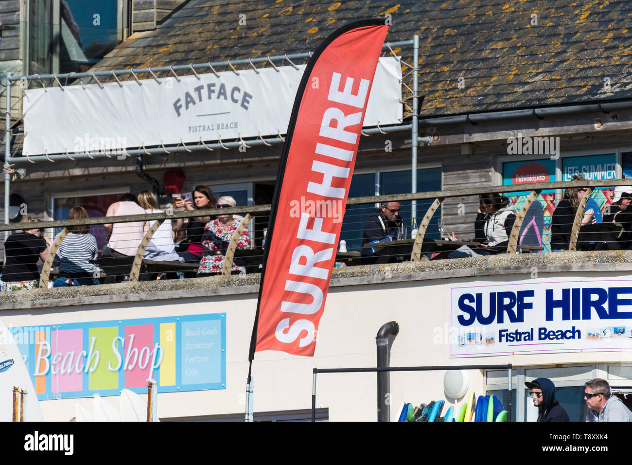 Surf hire signs at Fistral in Newquay in Cornwall Stock Photo - Alamy