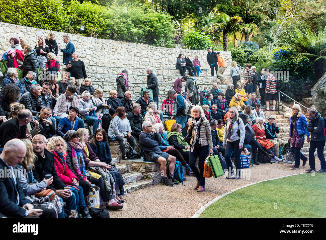 Audience arriving at the open air amphitheatre at Trebah Garden in ...