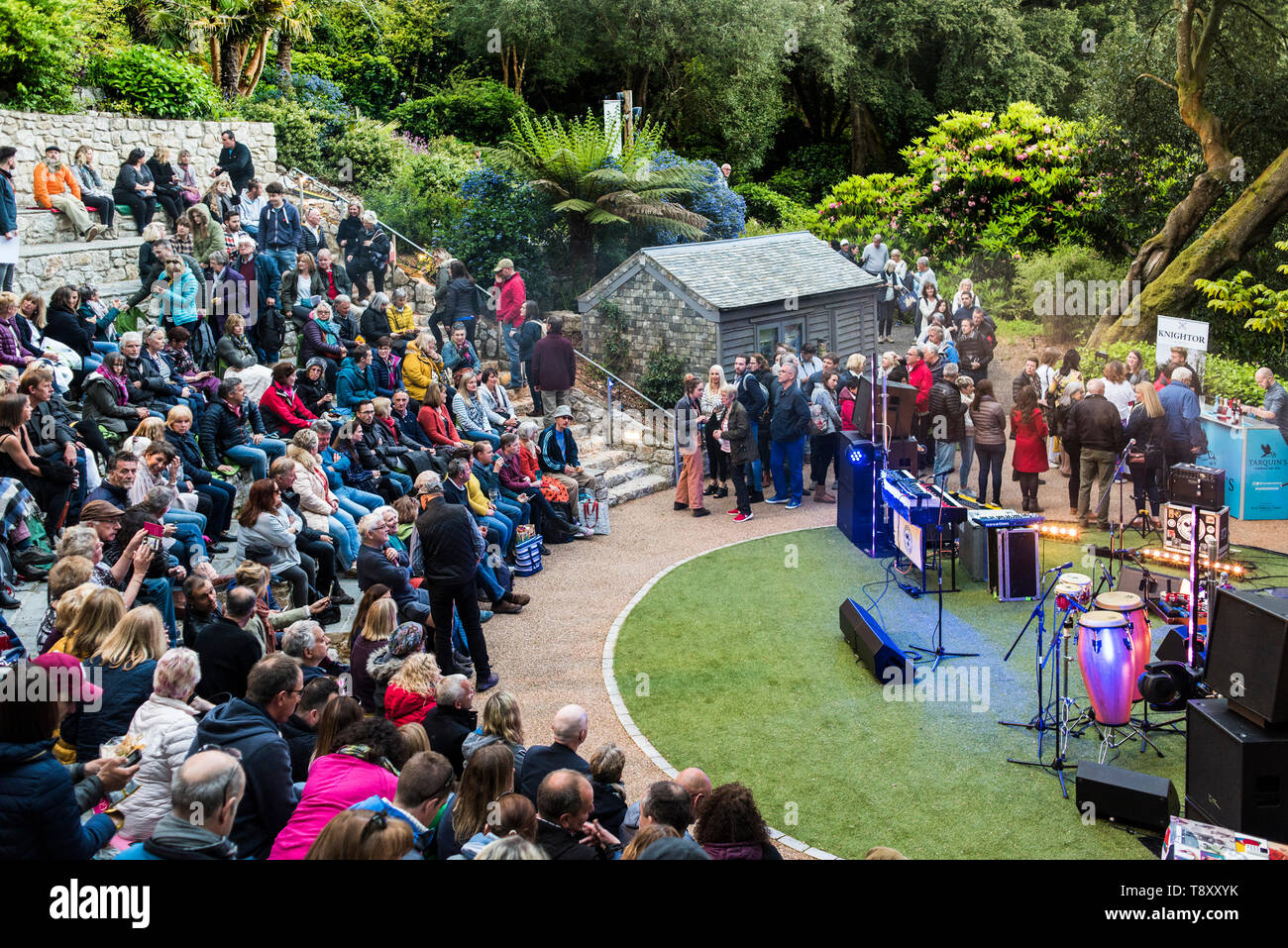 Audience arriving in the open air Amphitheatre at Trebah Garden in ...