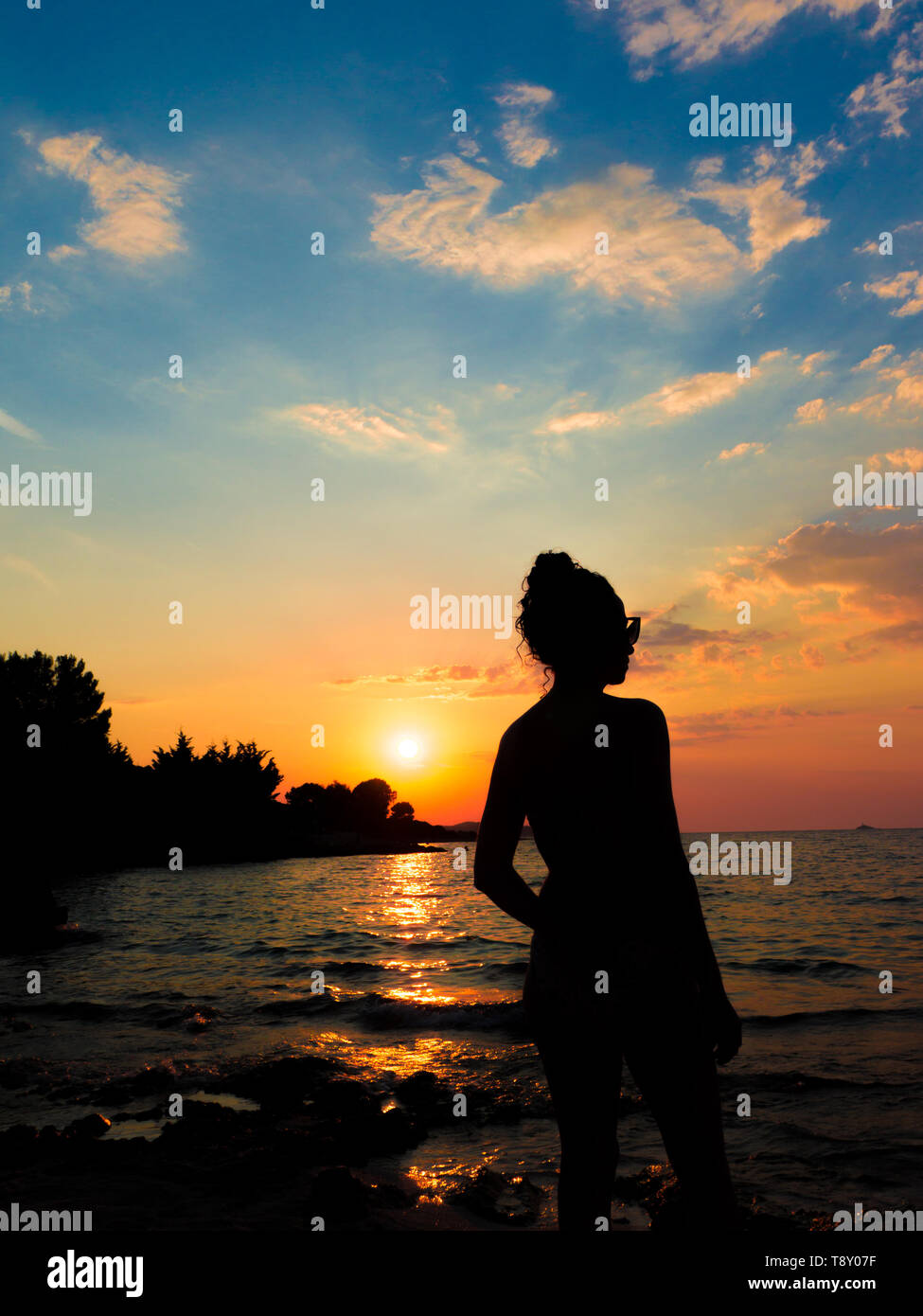 Silhouette against the sunset hi-res stock photography and images - Alamy