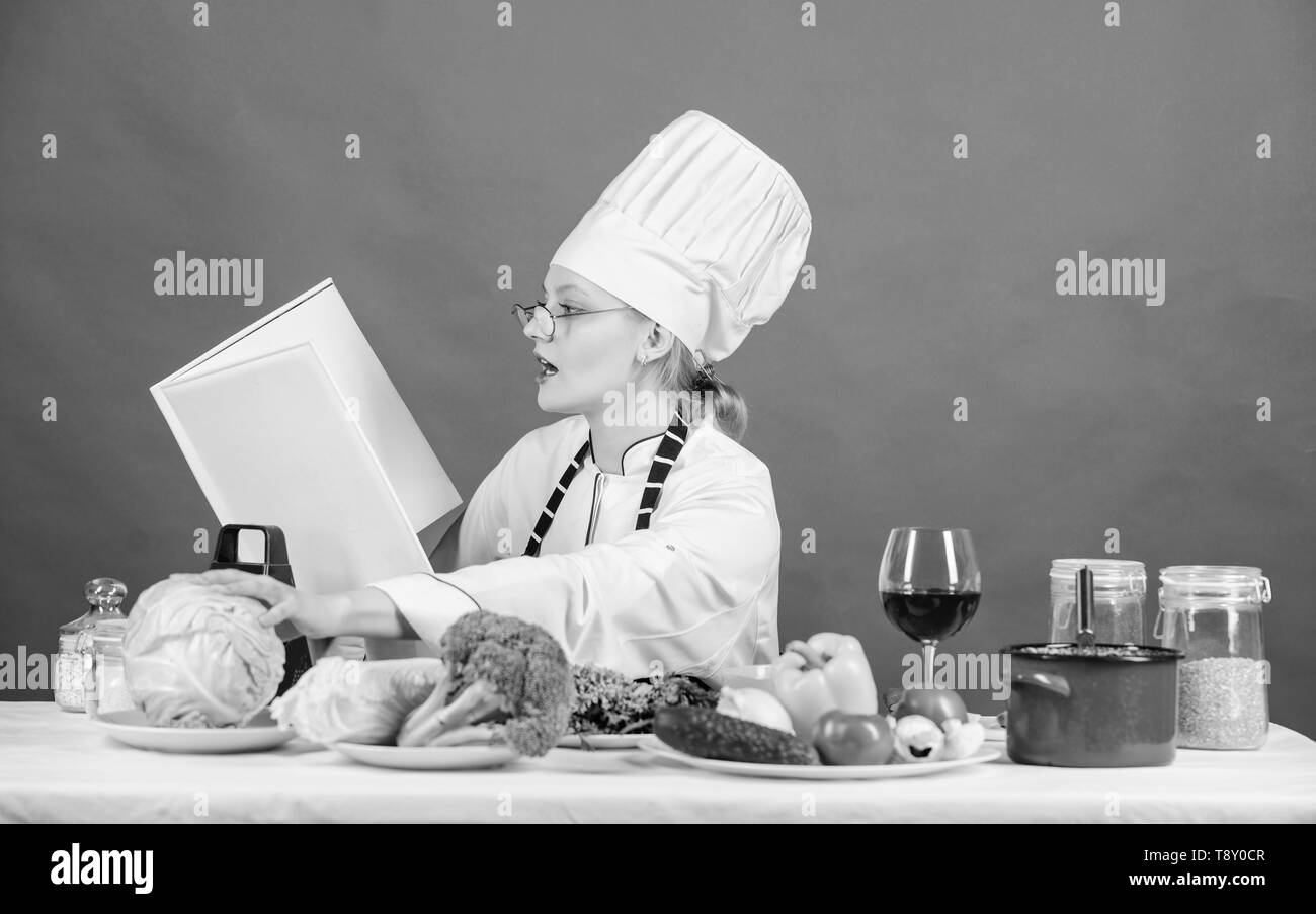 Female in hat and apron knows everything about culinary arts. Improve ...
