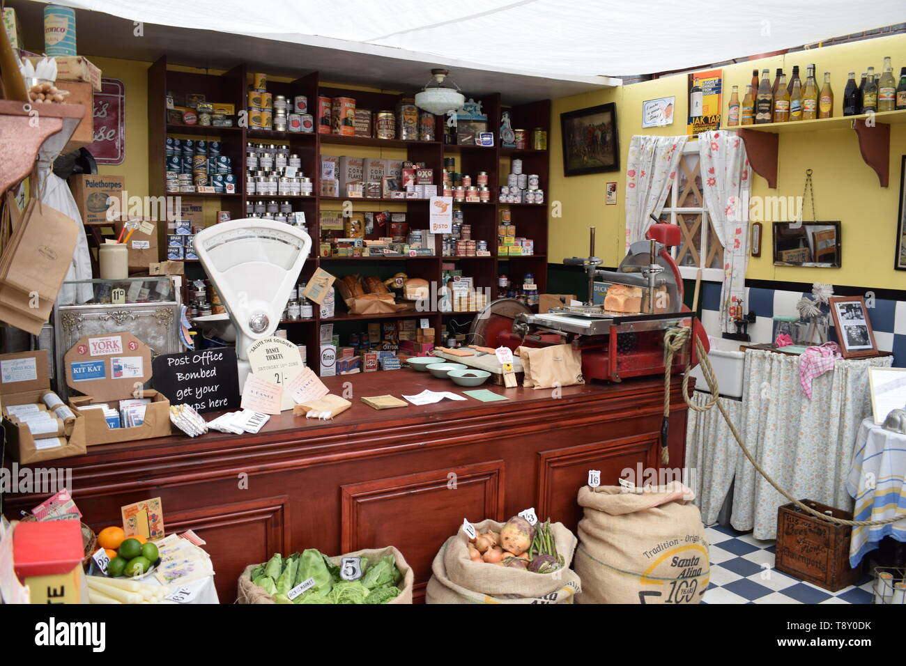 Winston Churchill next to King George delivering a speech in a re ...
