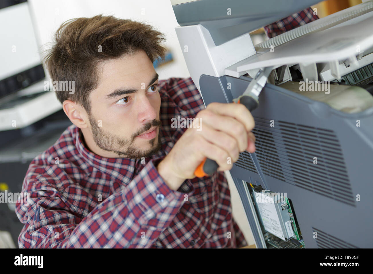 fixing printer with tool Stock Photo - Alamy