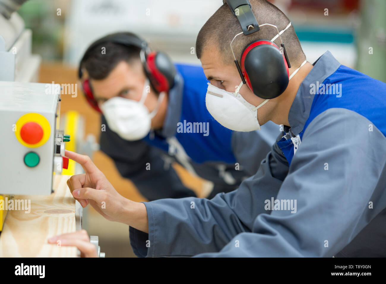 Man operating machines hi-res stock photography and images - Alamy