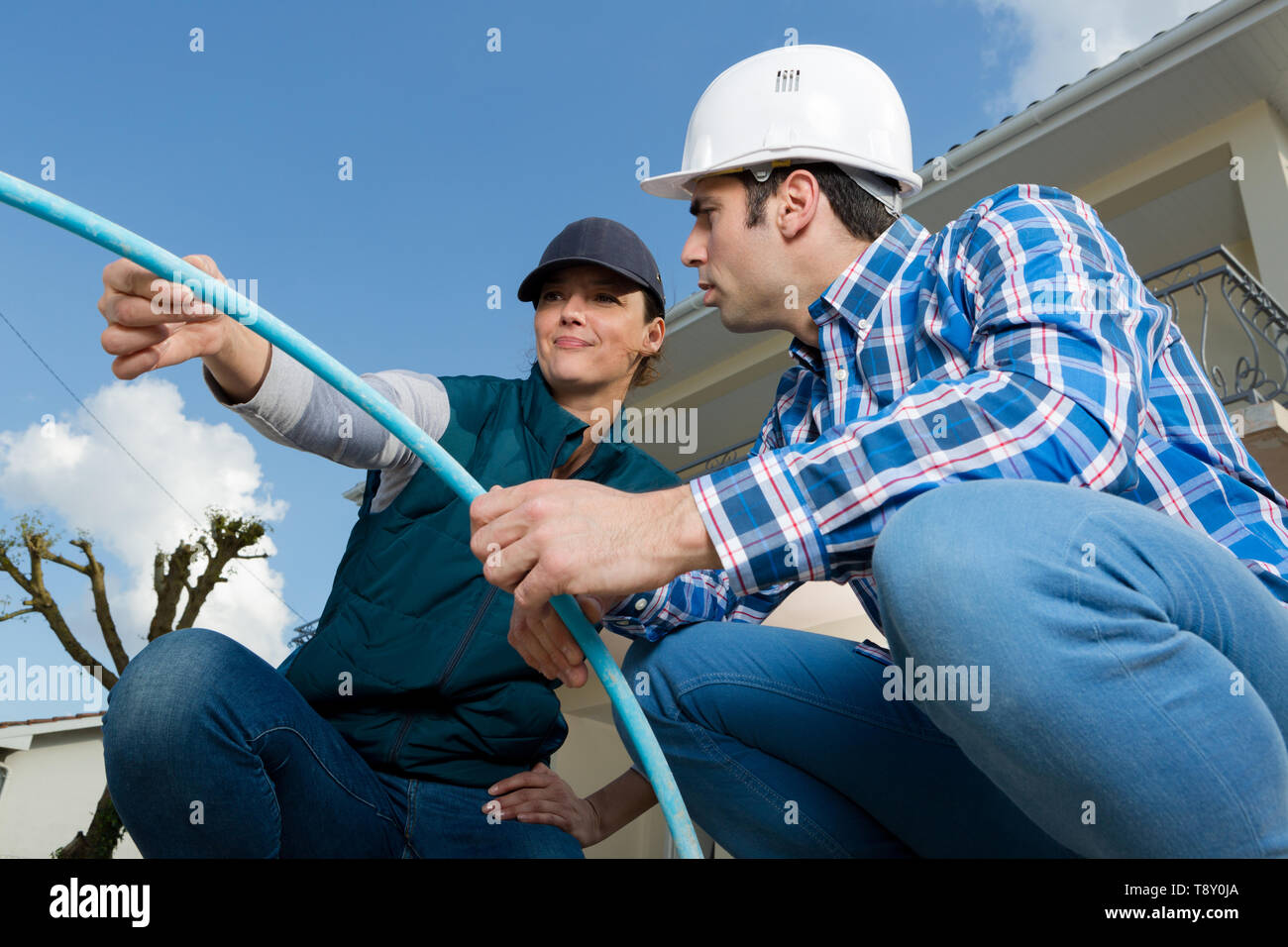 worker construction building outside Stock Photo - Alamy