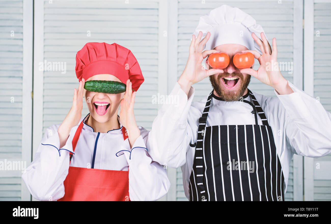 Healthy happy diet. Master cook and helper playing with vegetables in ...