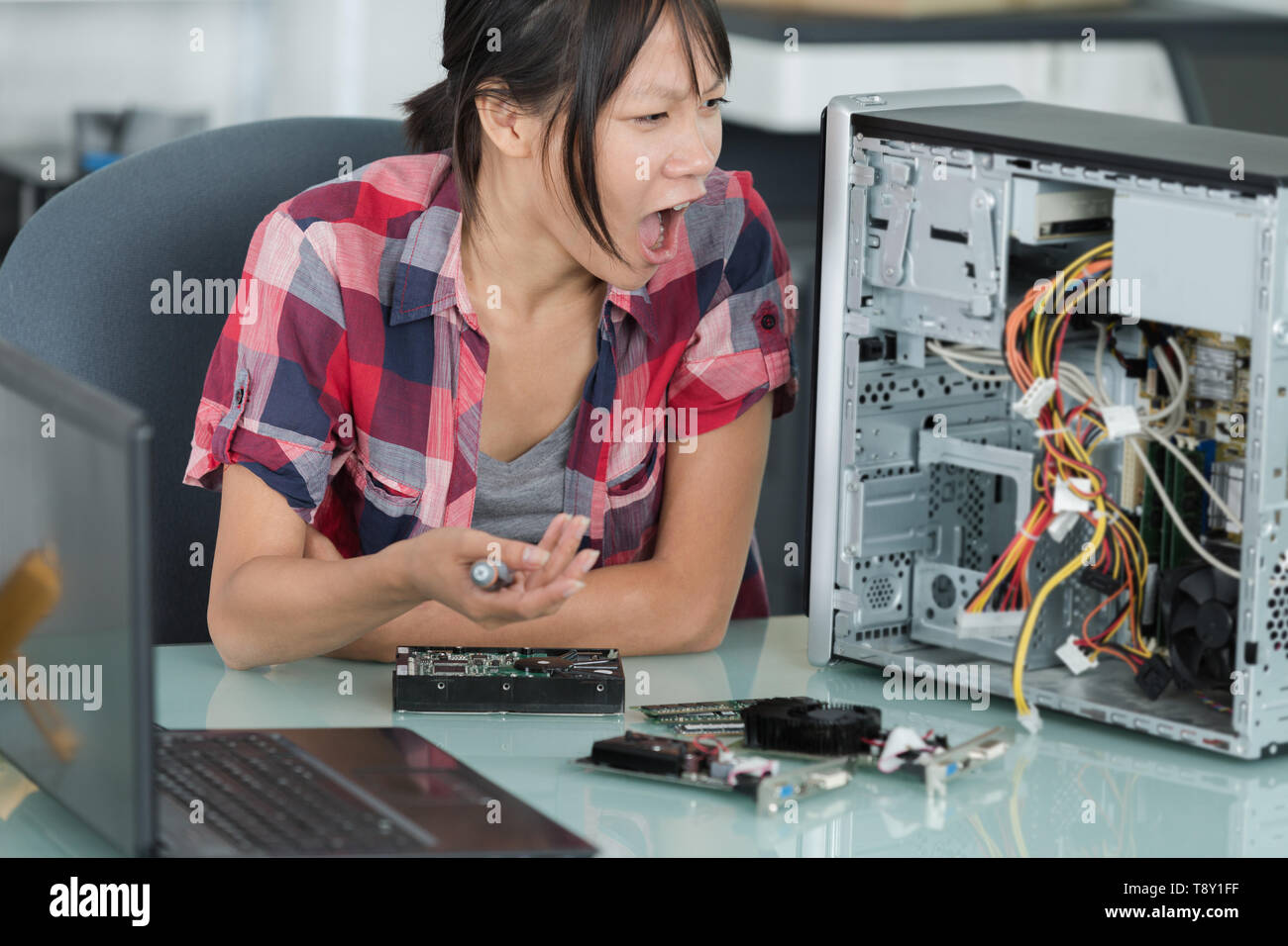 Woman fixing cpu hi-res stock photography and images - Alamy