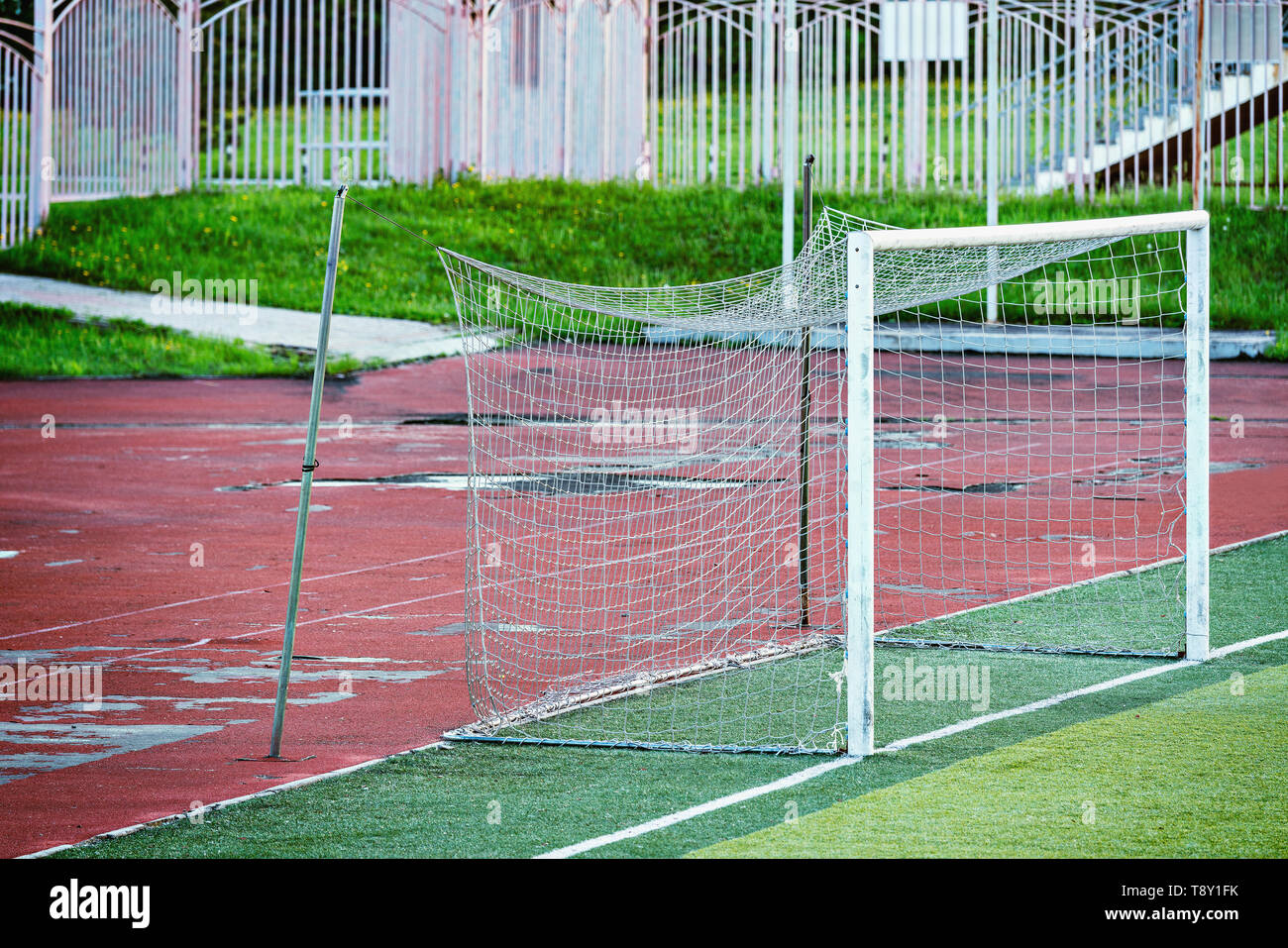 Football gate on the old empty stadium Stock Photo - Alamy