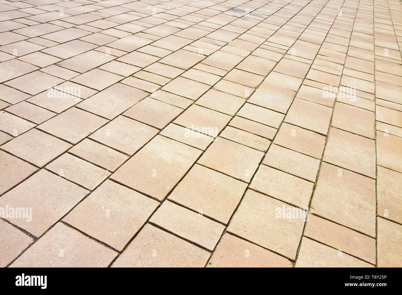 New paving made with colored stone blocks of different sizes Stock ...