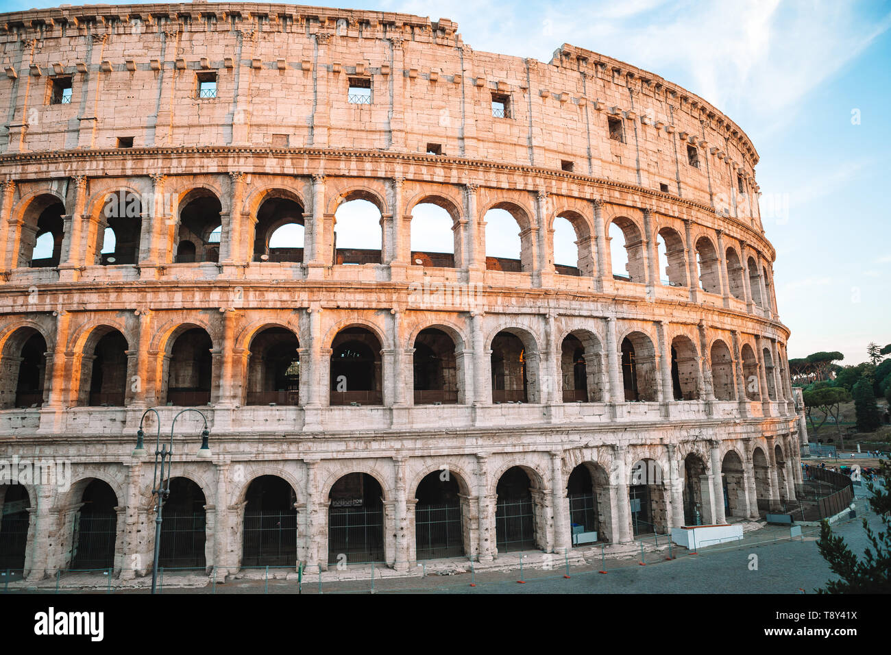 Colosseum or Coliseum background blue sky in Rome Stock Photo - Alamy