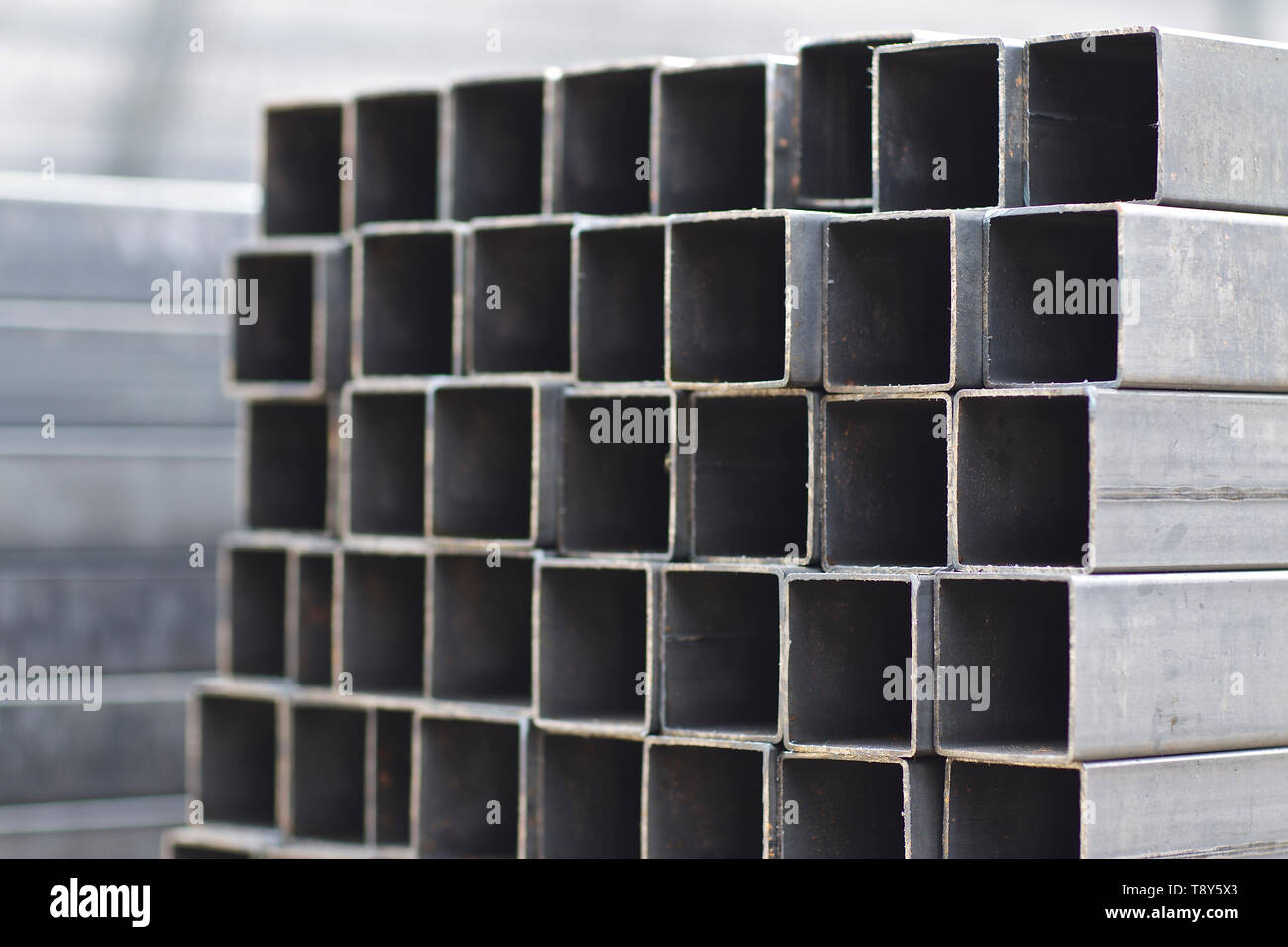 Metal profile pipe of rectangular cross section in packs at the ...