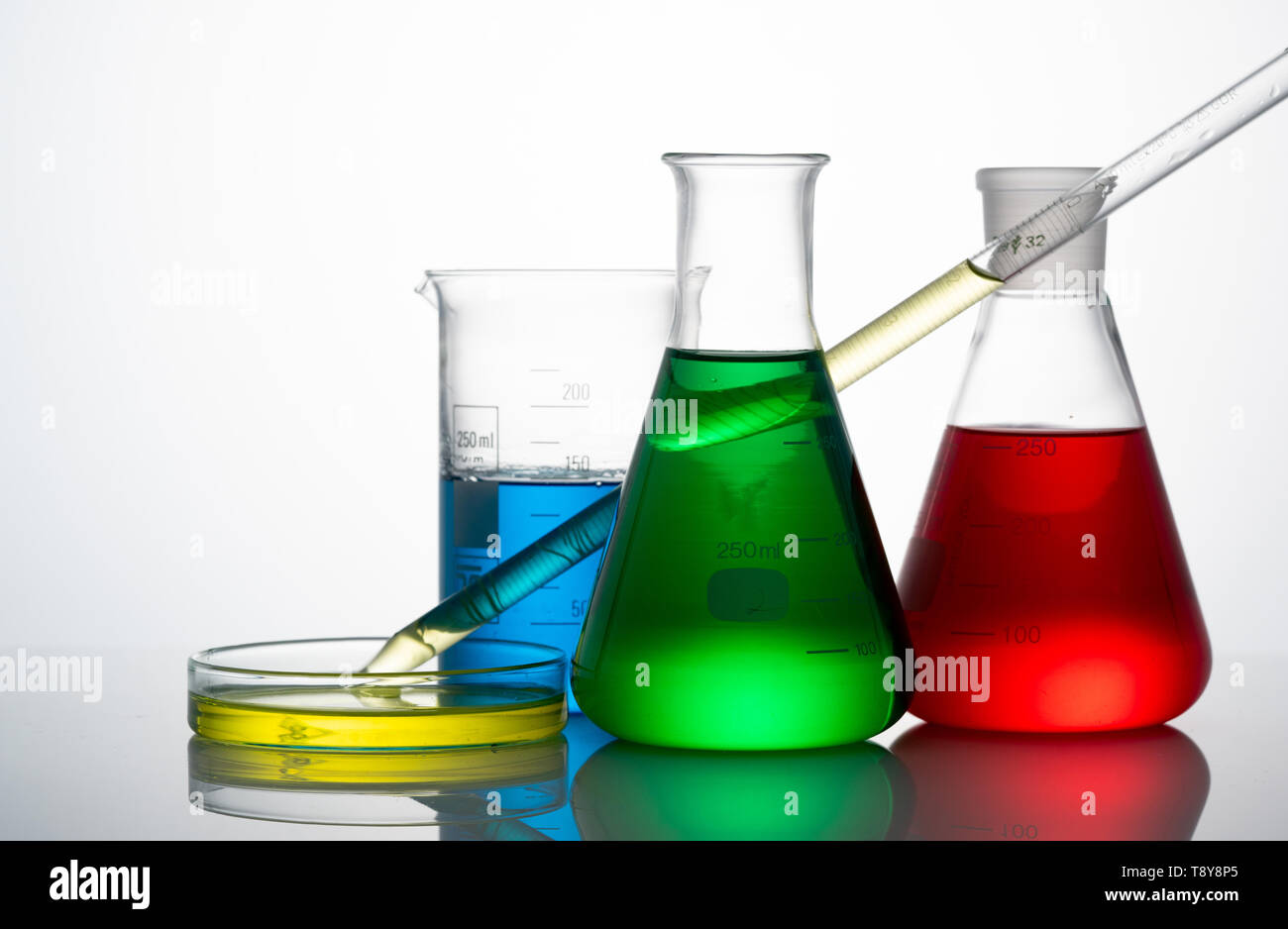 Chemical science glass on white background Stock Photo - Alamy