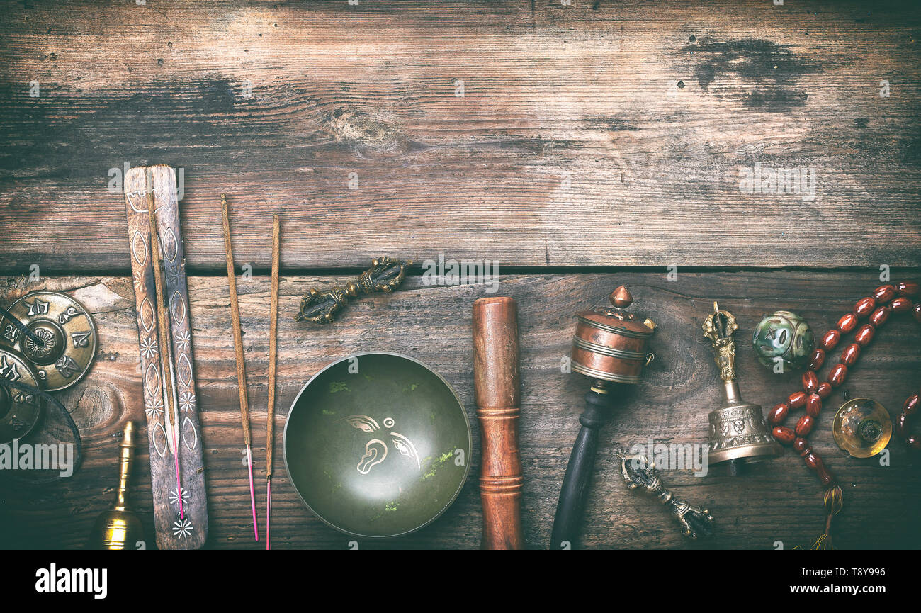 Copper singing bowl, prayer beads, prayer drum and other Tibetan ...