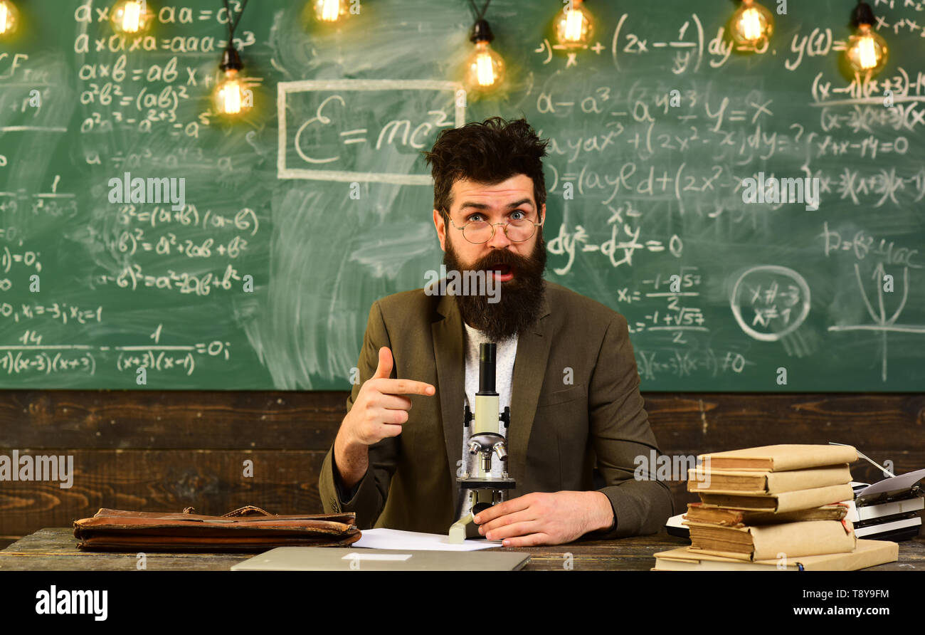 Teacher Correcting Students Work High Resolution Stock Photography and ...