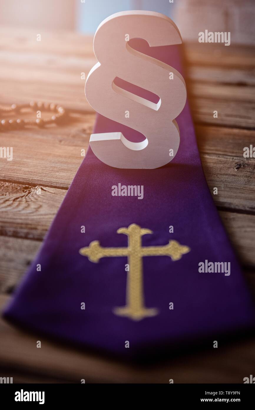 Catholic church symbols and wooden white paragraph symbol of law ...