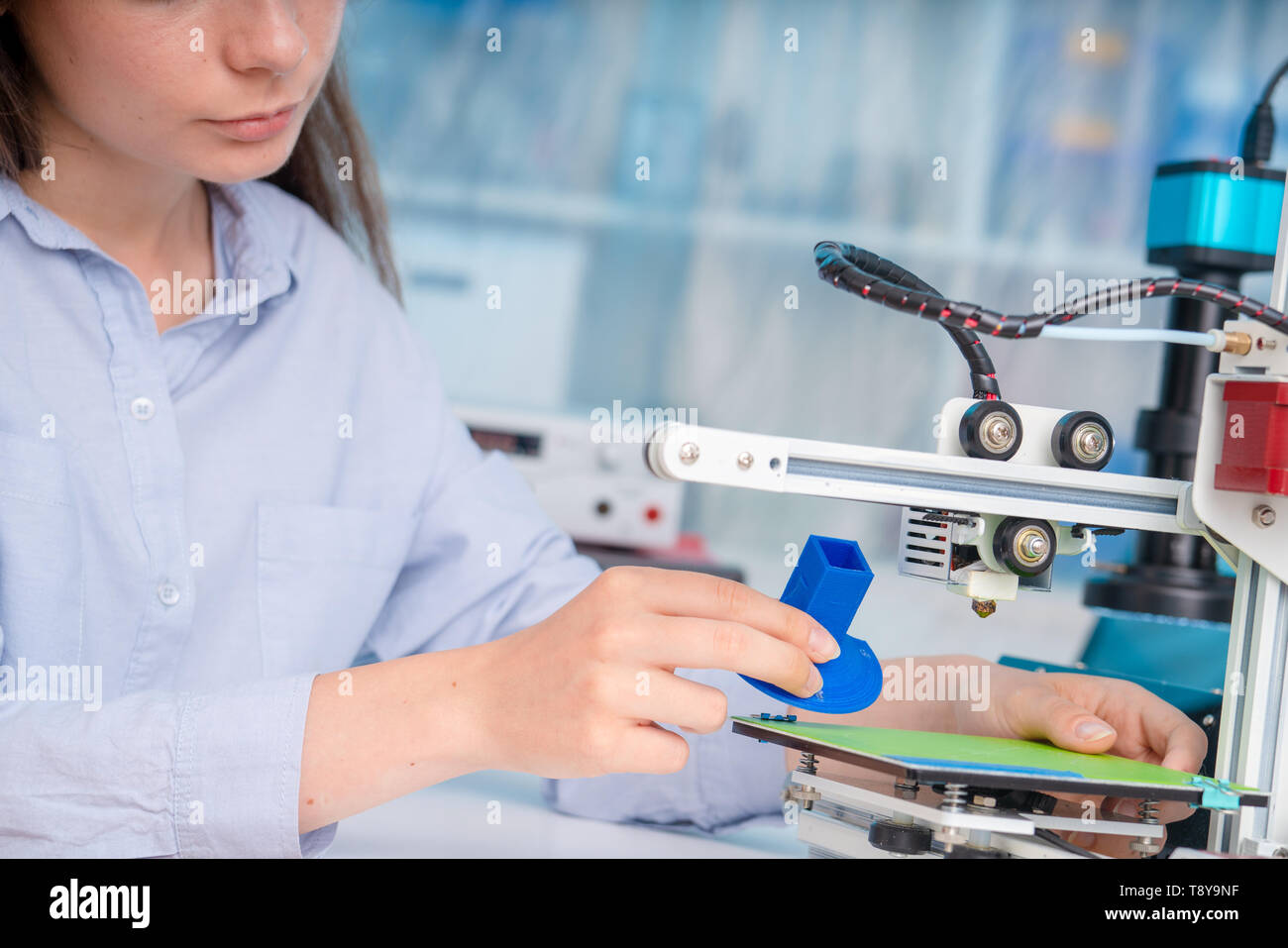 A student girl print prototype on 3D printer Stock Photo - Alamy