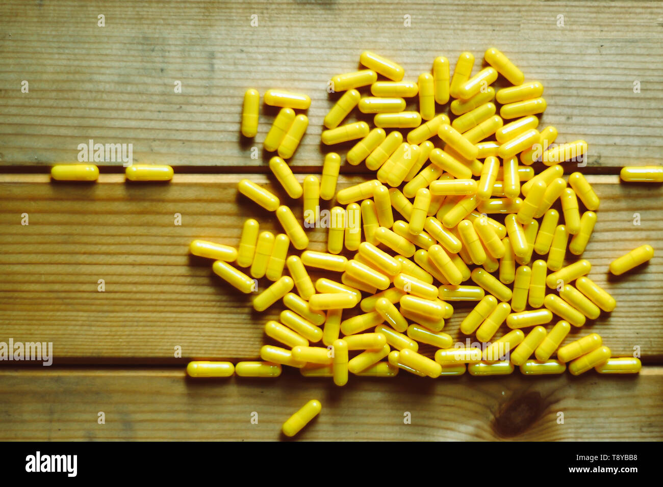 yellow pills and tablets capsules health concept idea background Stock ...