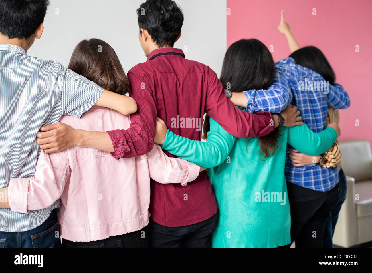 best friend holding hand shoot from behind Stock Photo - Alamy