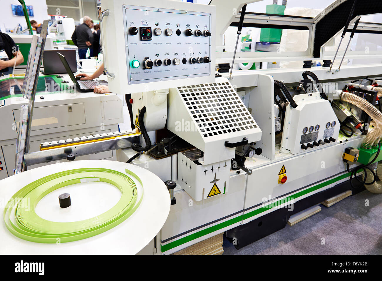 Single sided automatic edge banders CNC on factory Stock Photo - Alamy