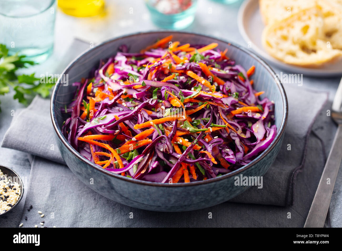 Red cabbage salad, Coleslaw in a bowl. Grey background. Close up Stock ...