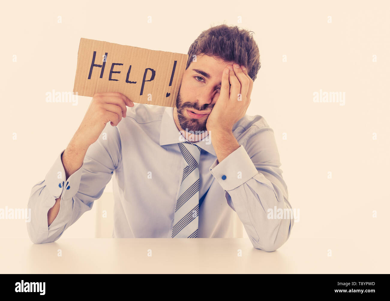 Desperate and frustrated caucasian young businessman holding message ...