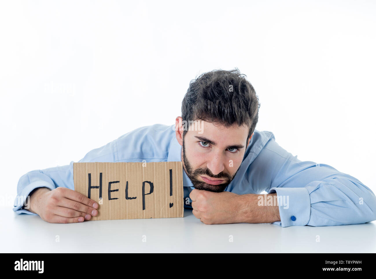 Desperate and frustrated caucasian young businessman holding message ...