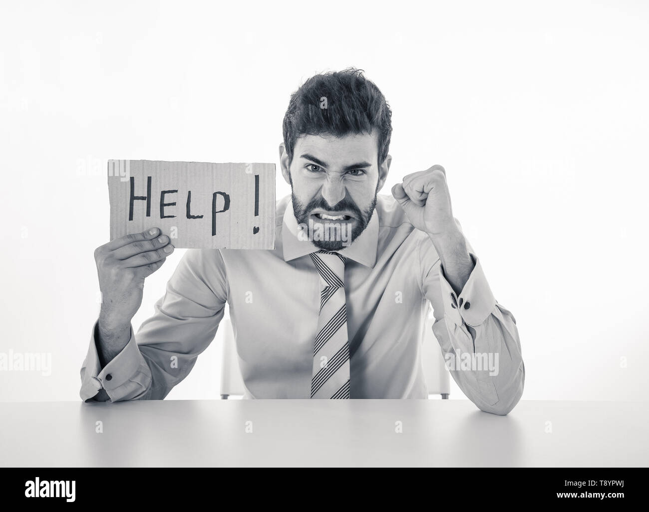 Desperate and frustrated caucasian young businessman holding message ...