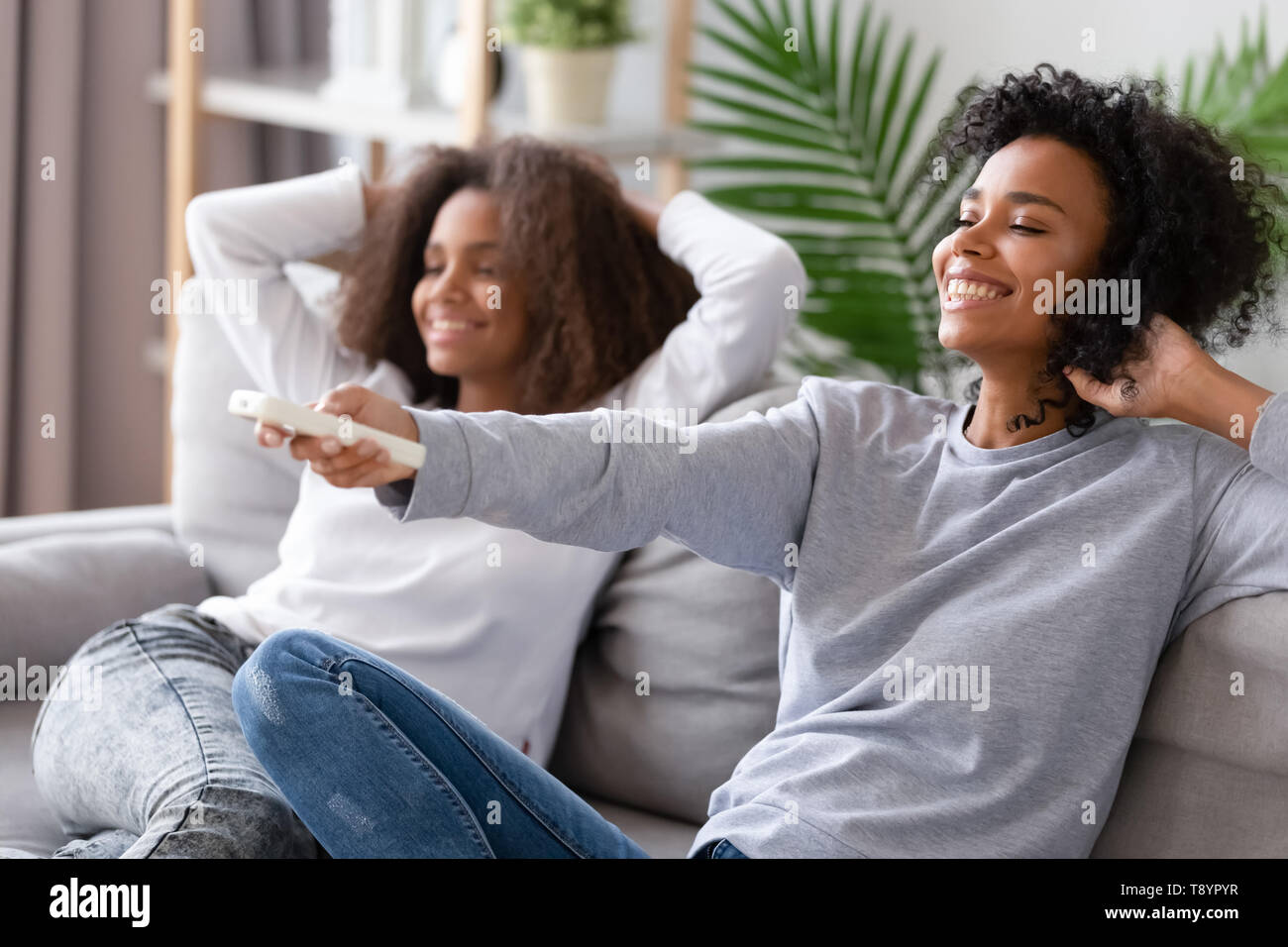 Lazy family weekend african american hi-res stock photography and ...