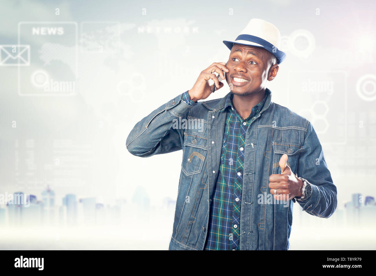 Young american african guy with cell phone. Handsome man. Device ...