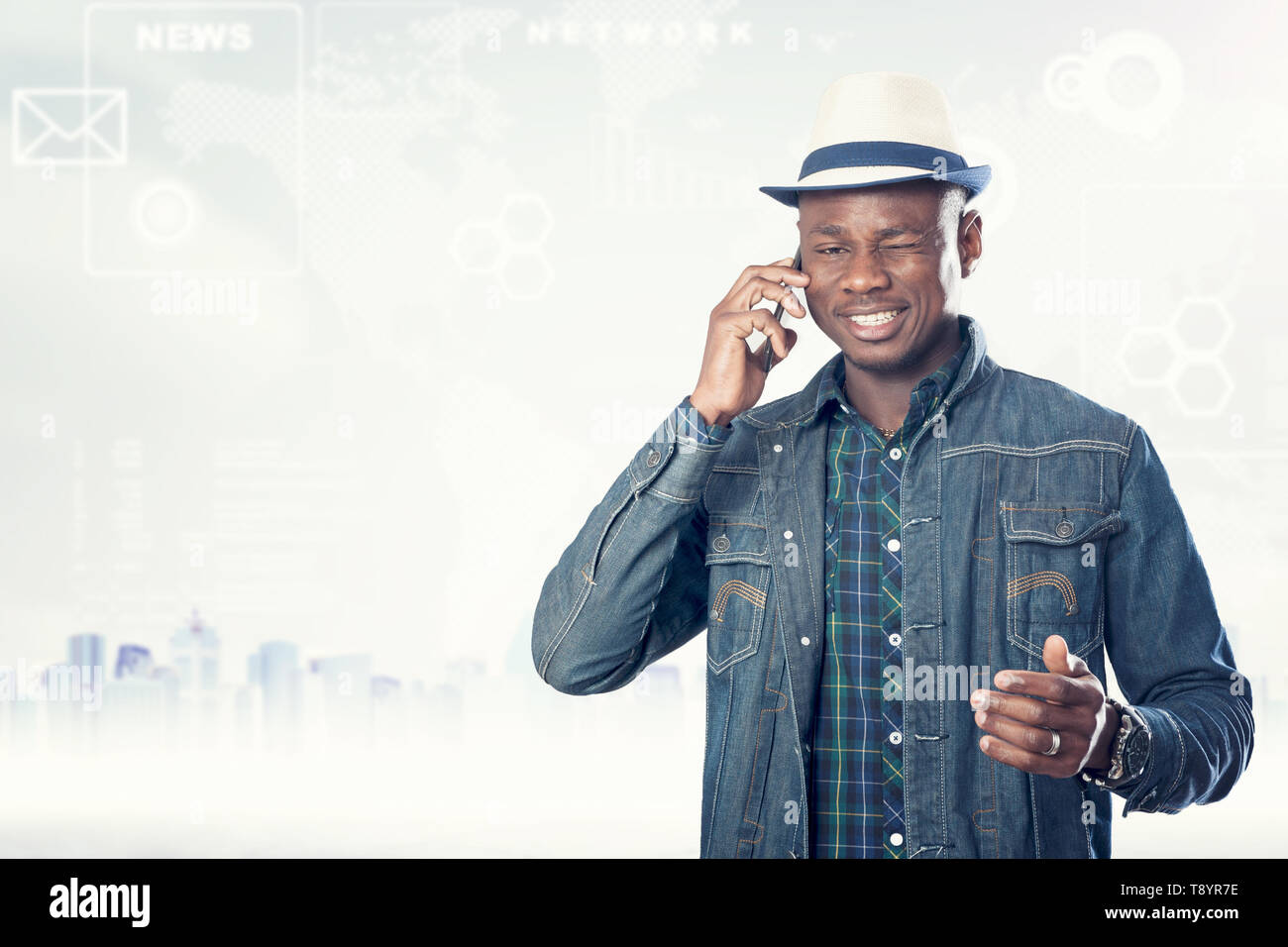 Young american african guy with cell phone. Handsome man. Device ...