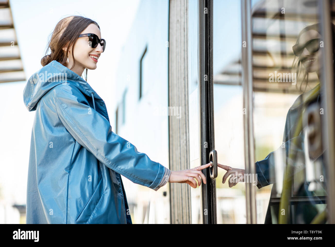 Woman entering train hi-res stock photography and images - Alamy