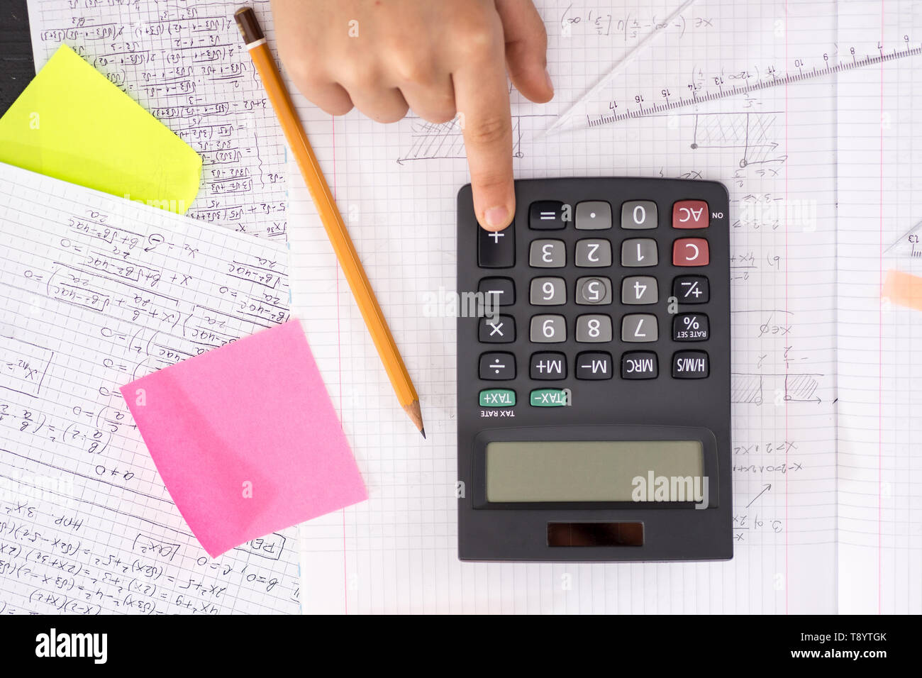 Finger on the Calculator Button During Mathematical Lesson. School ...