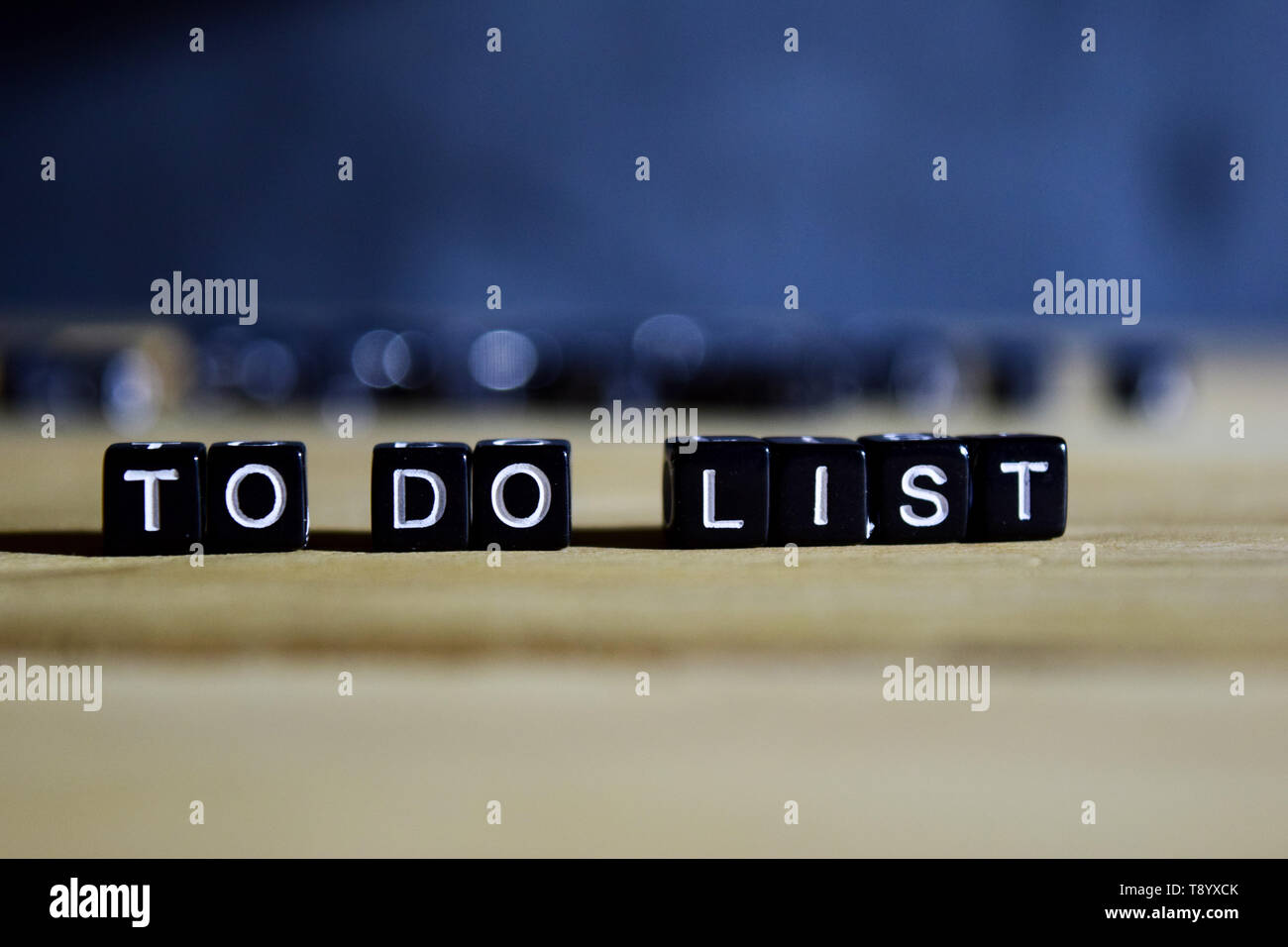 TO DO LIST concept wooden blocks on the table. With personal ...